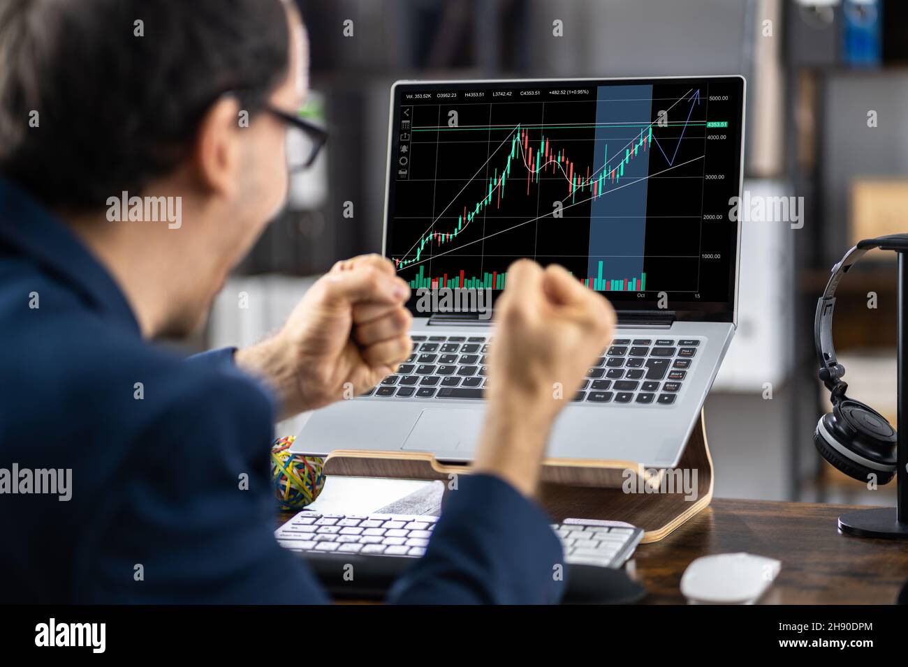 Successful Stock Market Trader Working On Laptop Stock Photo - Alamy