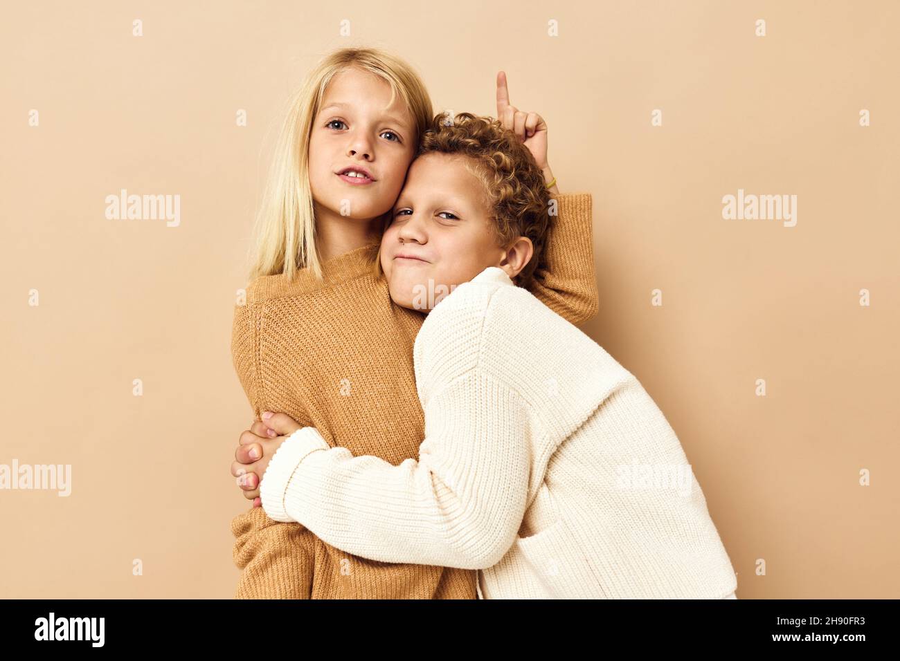 portrait of cute children hug games smile friendship isolated ...