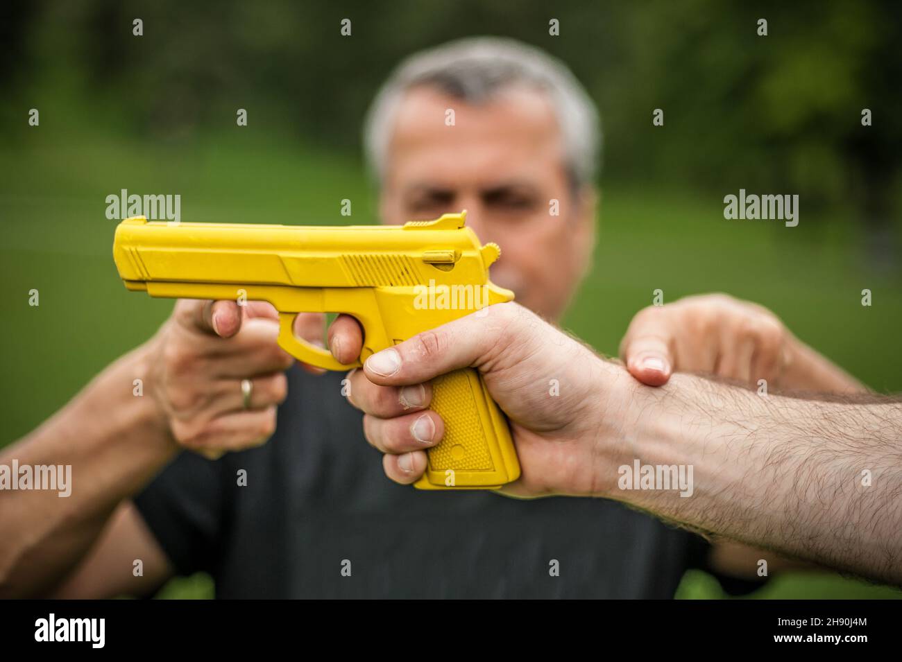 Weapon retention hi-res stock photography and images - Alamy