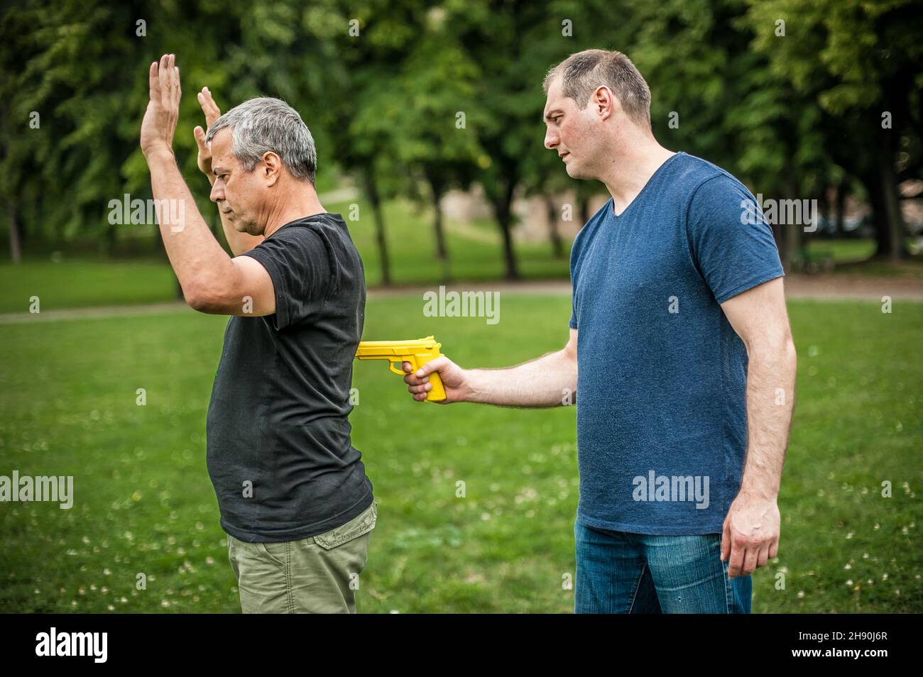 Kapap instructor demonstrates self defense techniques against a gun ...