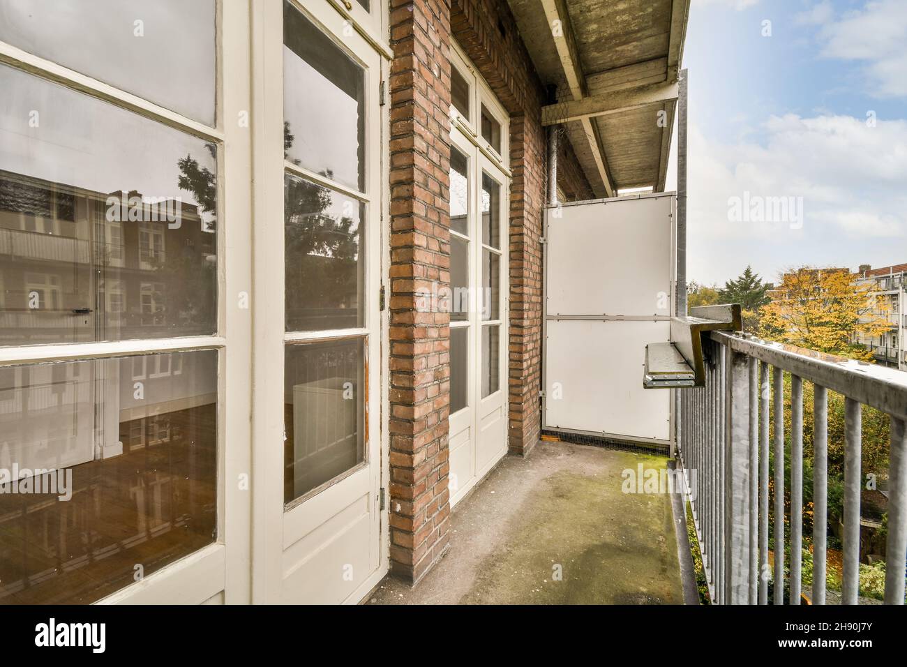 Balcony of a beautiful house in the daytime Stock Photo - Alamy