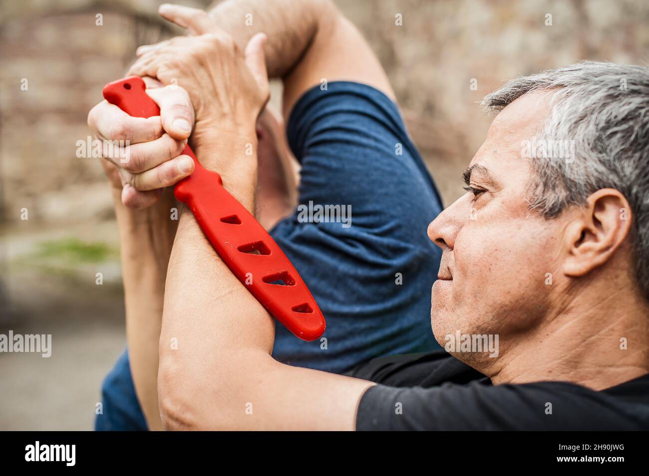 Knife disarm demonstration. Kapap instructor practice martial arts self ...