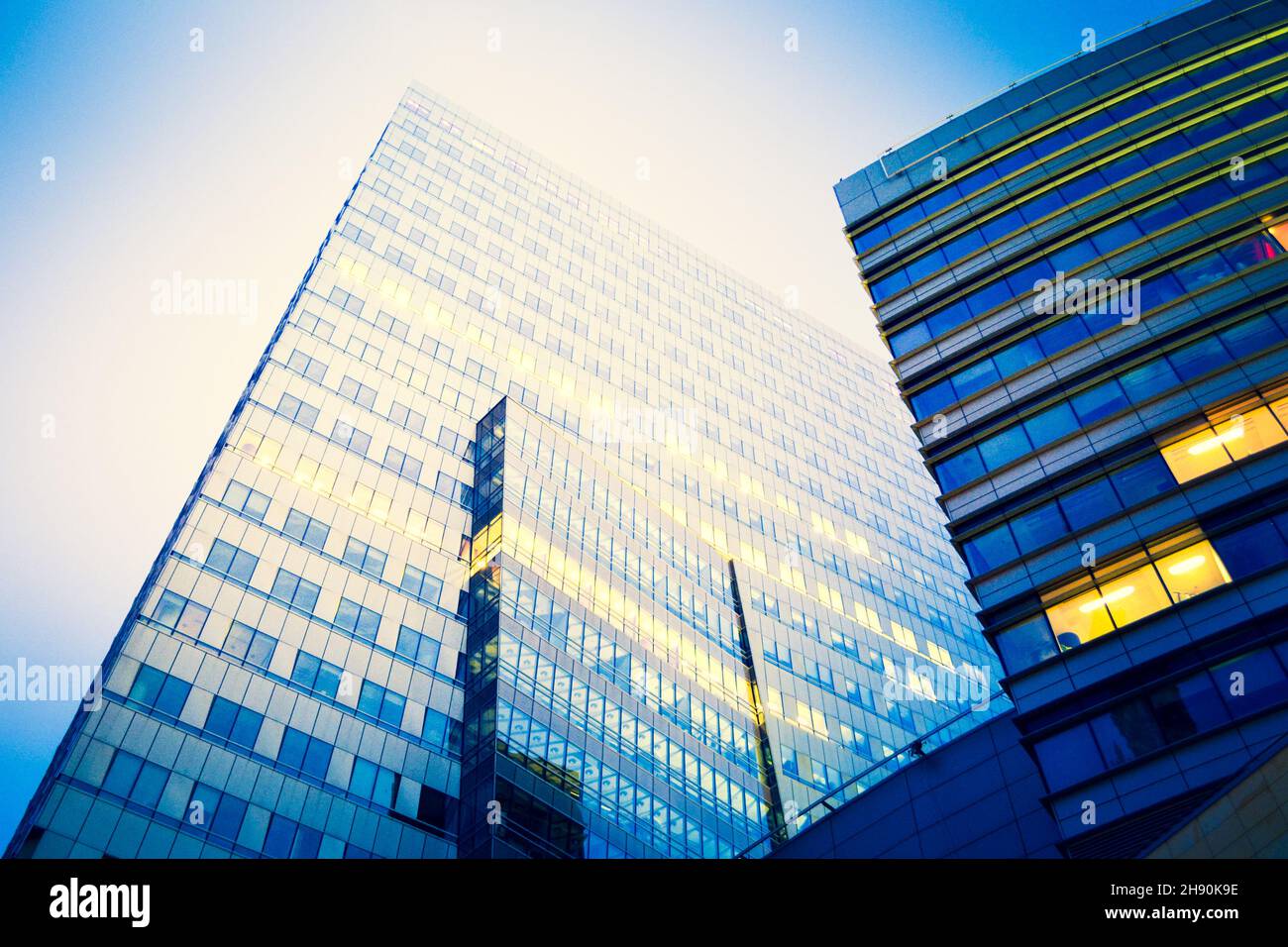 Two modern glass office buildings - business concept Stock Photo - Alamy