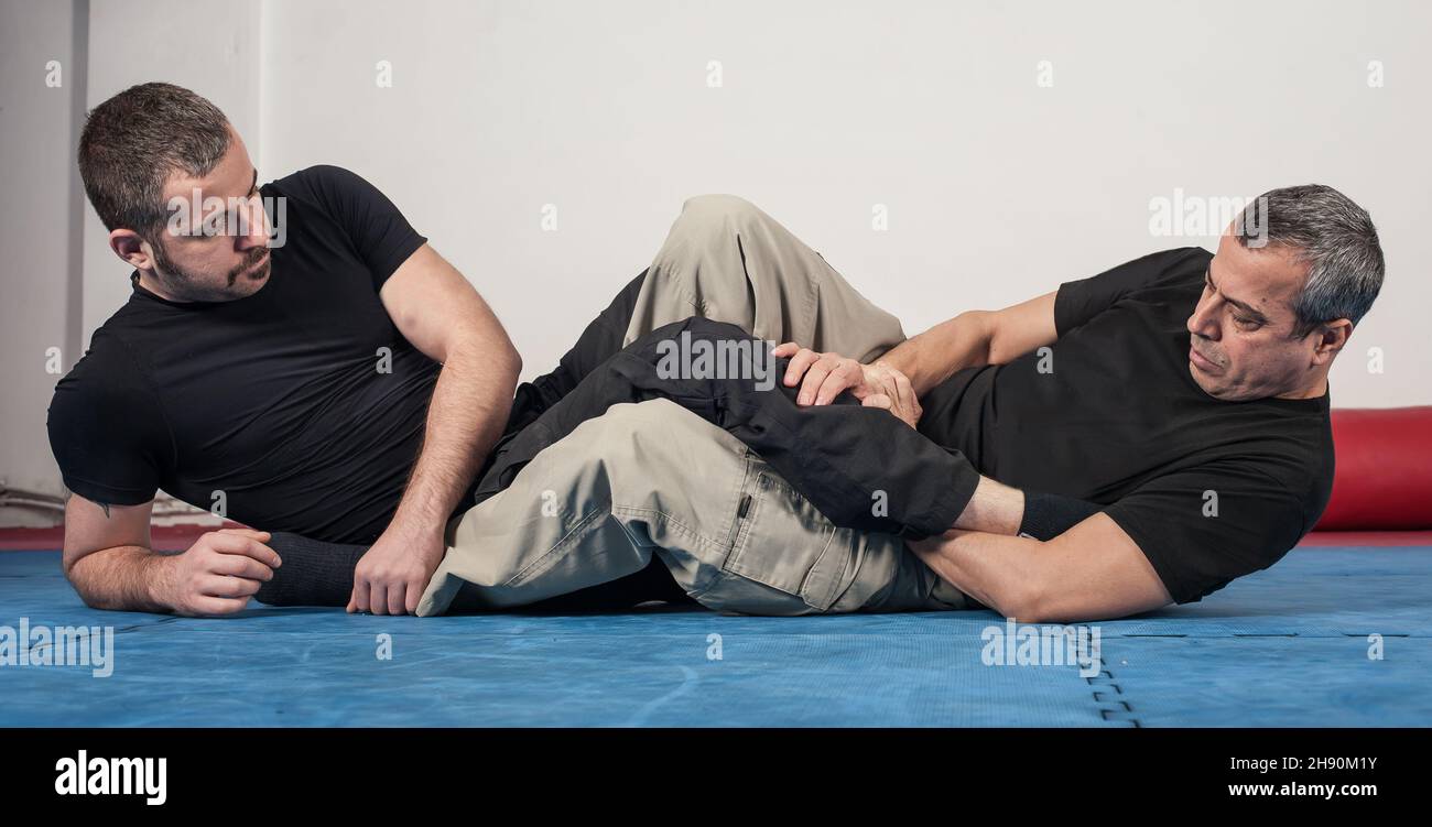 Ground fighting techniques hi-res stock photography and images - Alamy