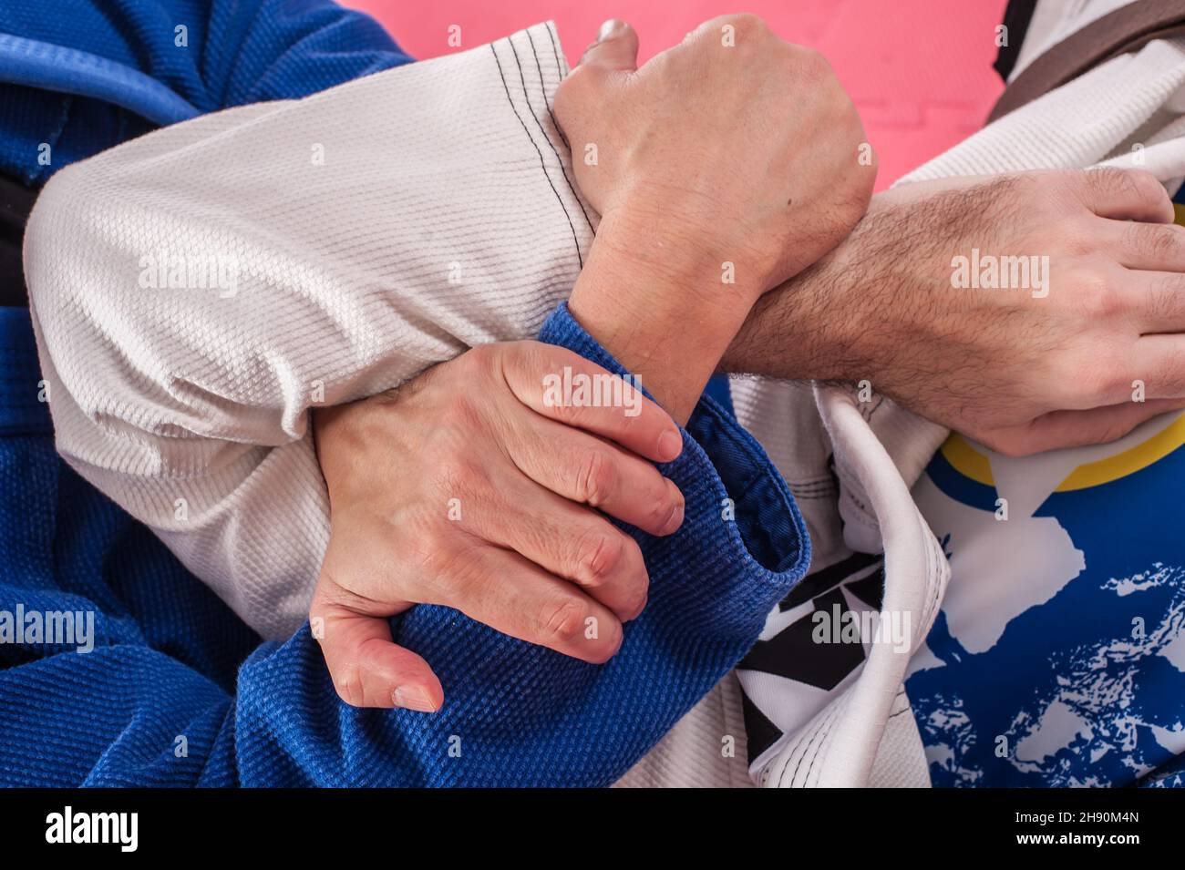 Kapap and brazilian jiu jitsu instructor in traditional kimono ...