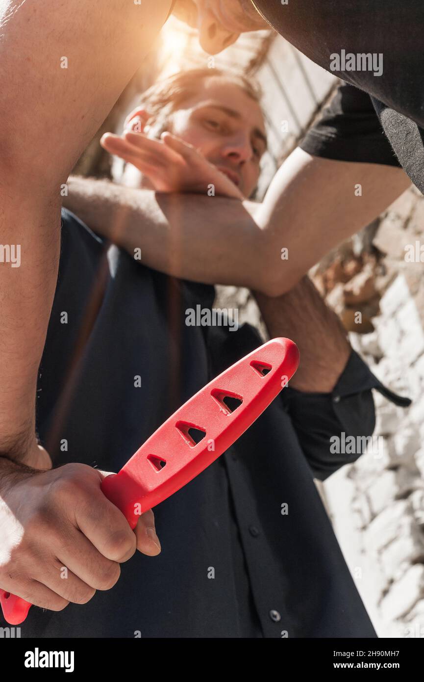 Combat using attack blocking techniques hi-res stock photography and ...