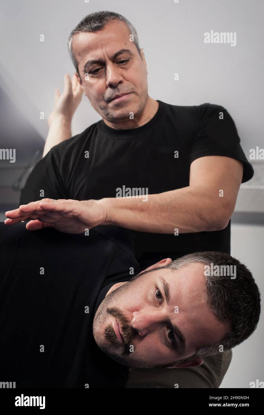 Kapap instructor demonstrates standing arm lock techniques with his ...