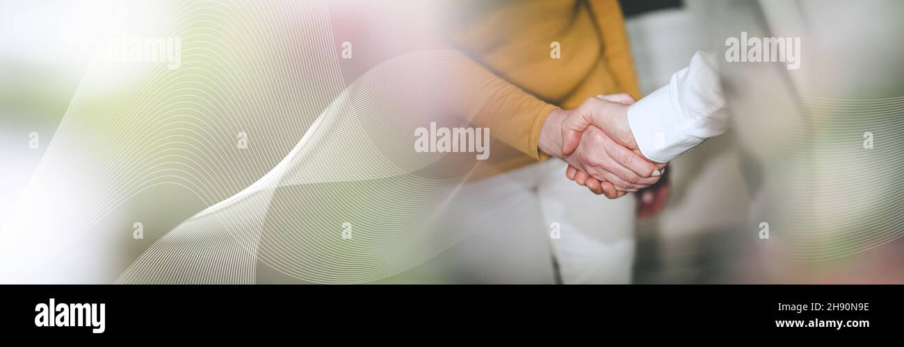Businesswoman and businessman shaking hands; panoramic banner Stock ...
