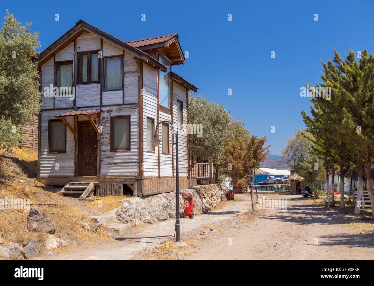 white painted wooden slated house, Camel Beach near Bodrum, Turkey ...