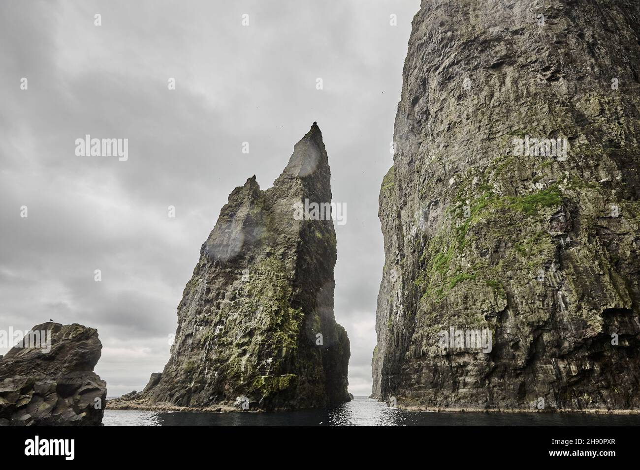 Stunning stone cliffs on atlantic ocean in Faroe islands Stock Photo ...
