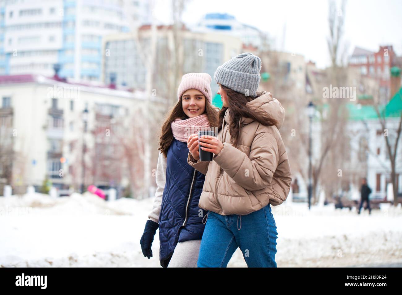 Two girls models walking hi-res stock photography and images - Alamy