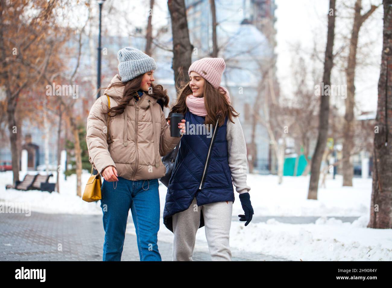 Two girls models walking hi-res stock photography and images - Alamy