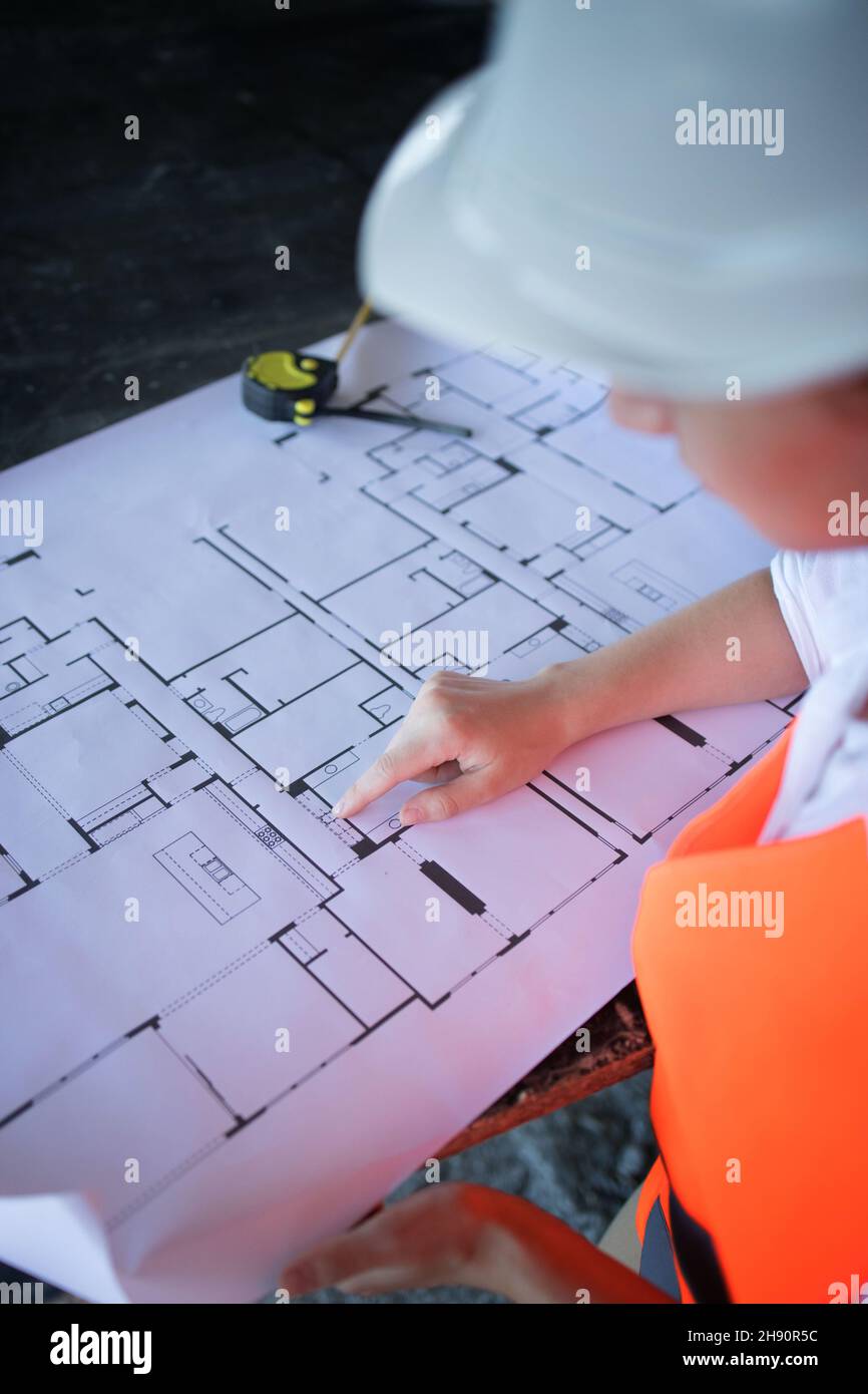 Architect working over plan. Closeup Desk With blueprints drawing Stock ...