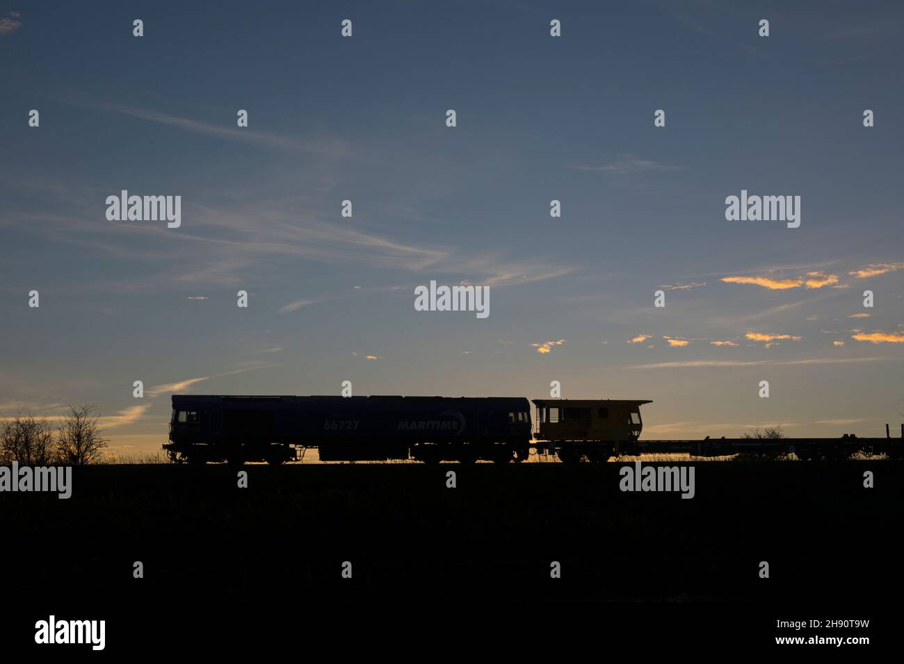 Class 66 diesel locomotive No. 66727 "Maritime One" pulling an ...