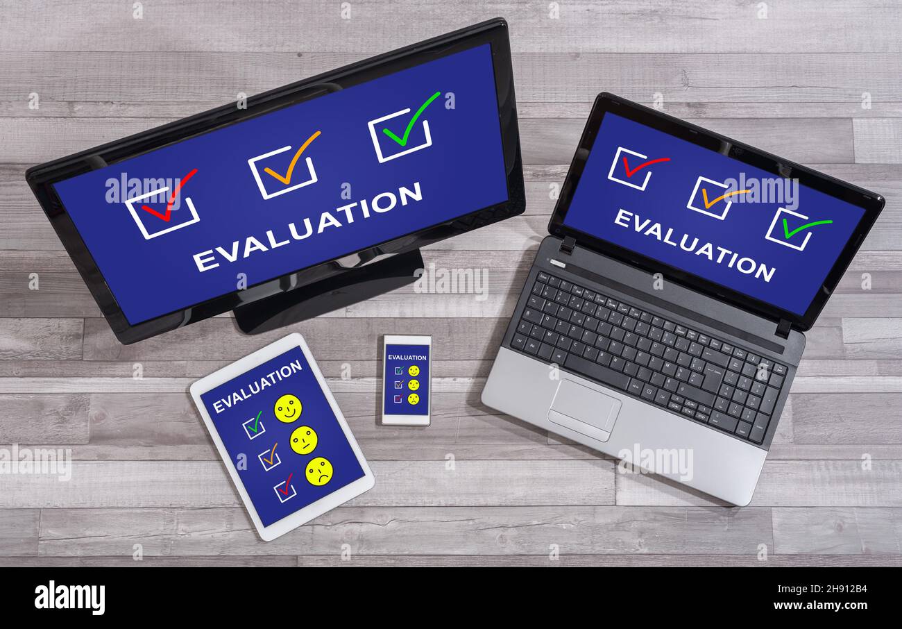 Evaluation concept shown on different information technology devices ...