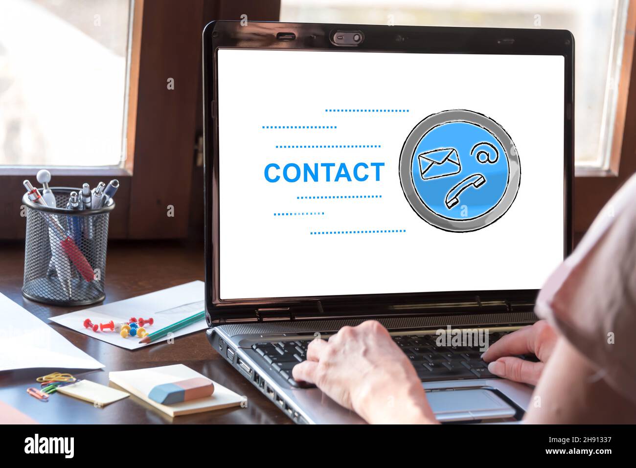 Laptop screen displaying a contact concept Stock Photo - Alamy