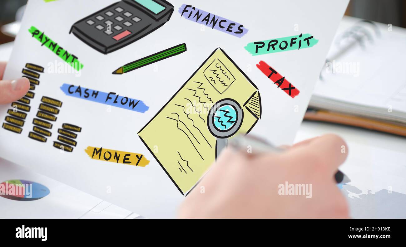 Hands holding a paper showing an accounting concept Stock Photo - Alamy