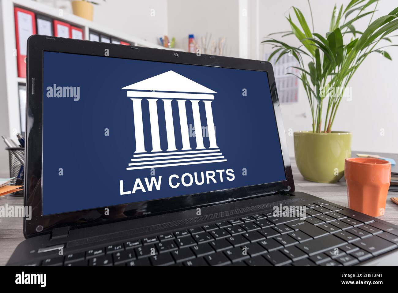 Laptop screen with law courts concept Stock Photo - Alamy