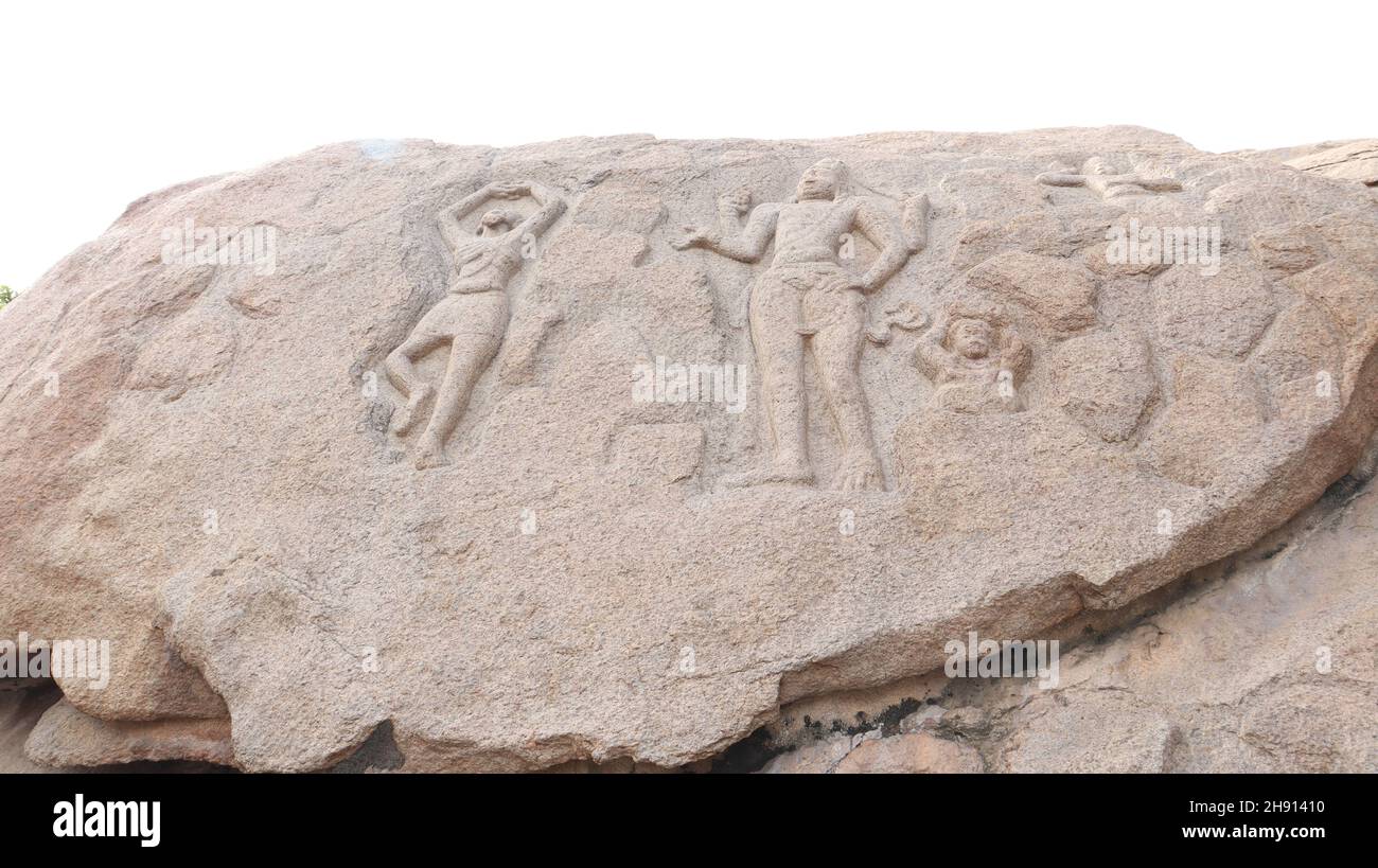 Arjuna's penance - ancient. Statues carved into the wall of the ...