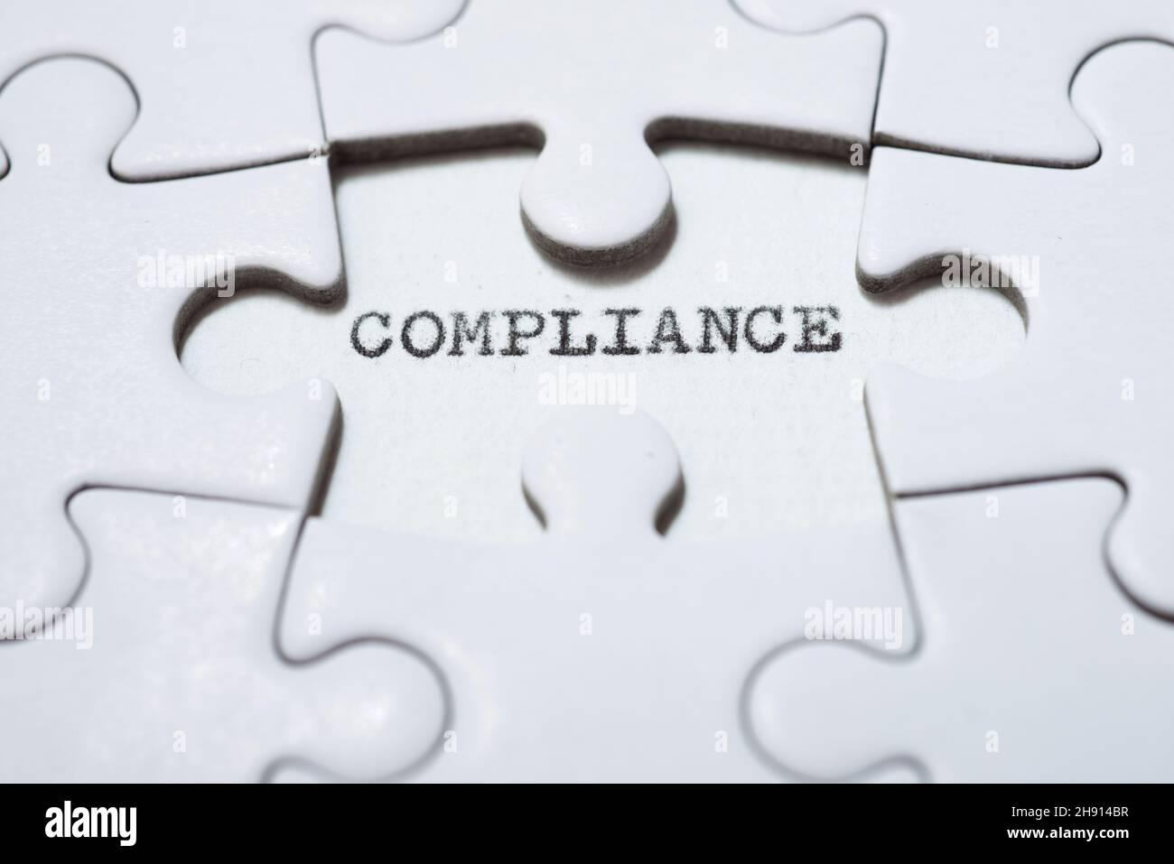 The word compliance written with a typewriter Stock Photo - Alamy