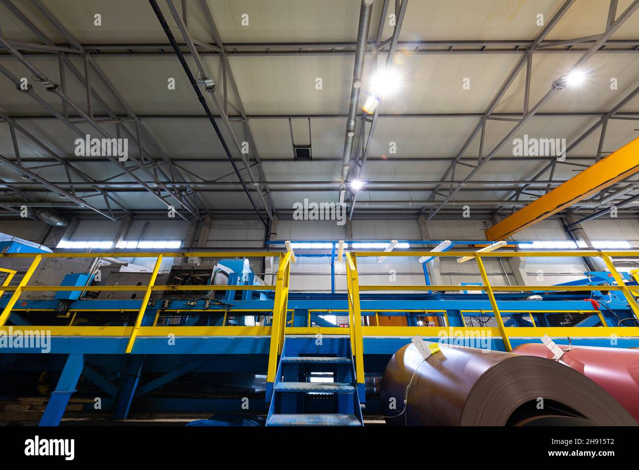 Production line of metal tile for roof. Steel forming machine in ...