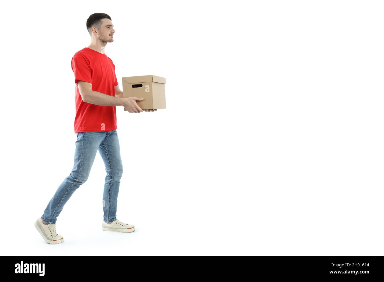 Delivery man walking with a box, isolated on white background Stock ...