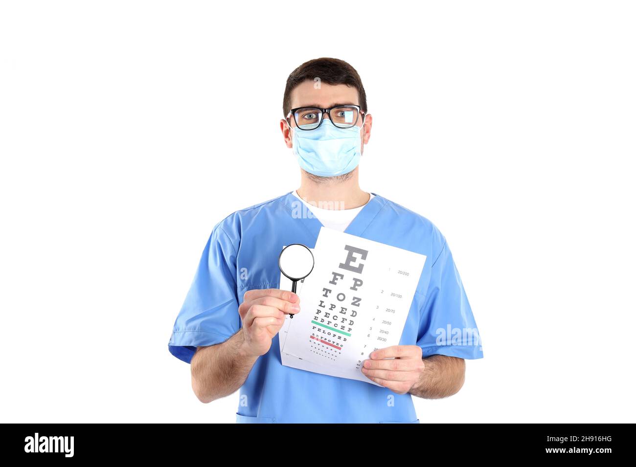 Doctor with magnifier and vision test isolated on white background ...