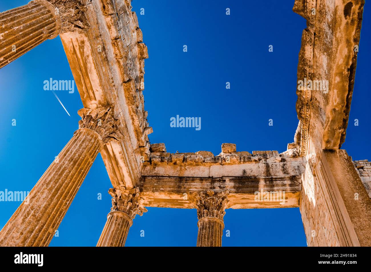 Low angle shot of famous Dougga archaeological site in Tunisia Stock ...