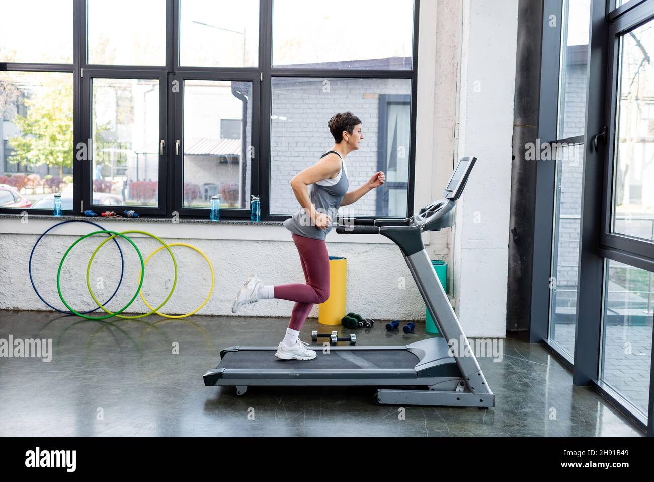 Person on treadmill profile view hi-res stock photography and images ...