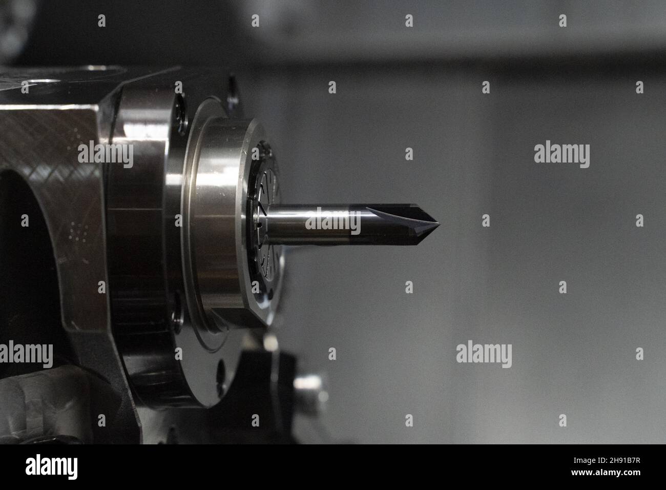 driven drilling tool in a cnc lathe Stock Photo - Alamy
