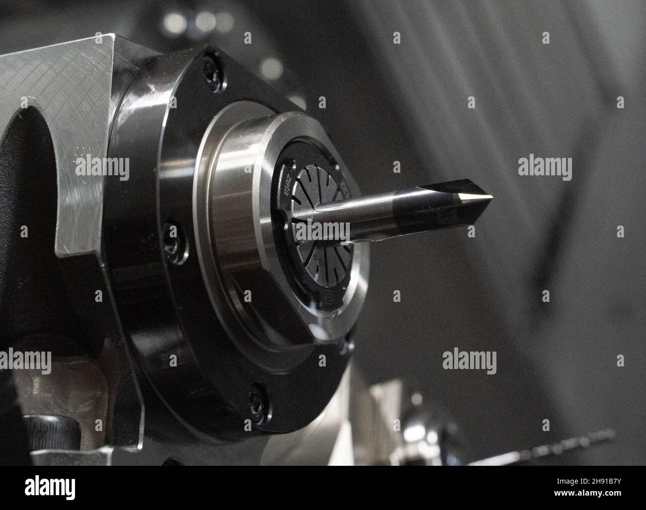 driven drilling tool in a cnc lathe Stock Photo - Alamy