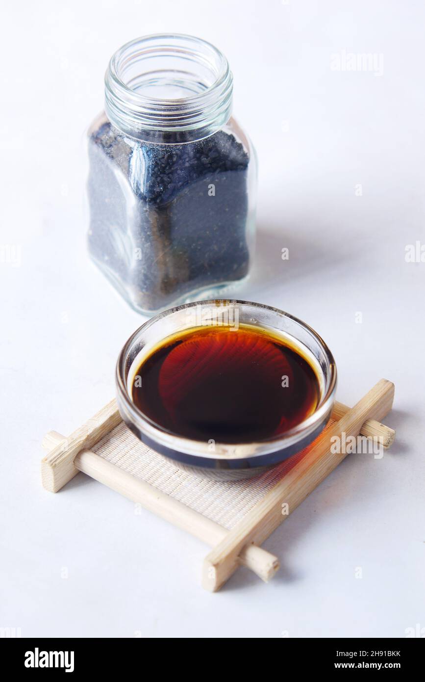 Black cumin oil in container hi-res stock photography and images - Alamy