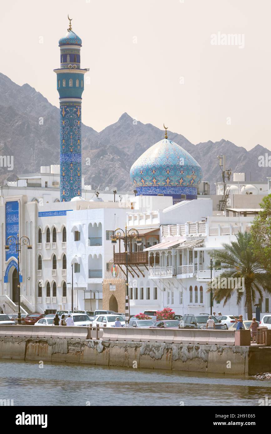 Muscat, Oman - 04.04.2018: Vertical shot of a blue mosque in the bay of ...