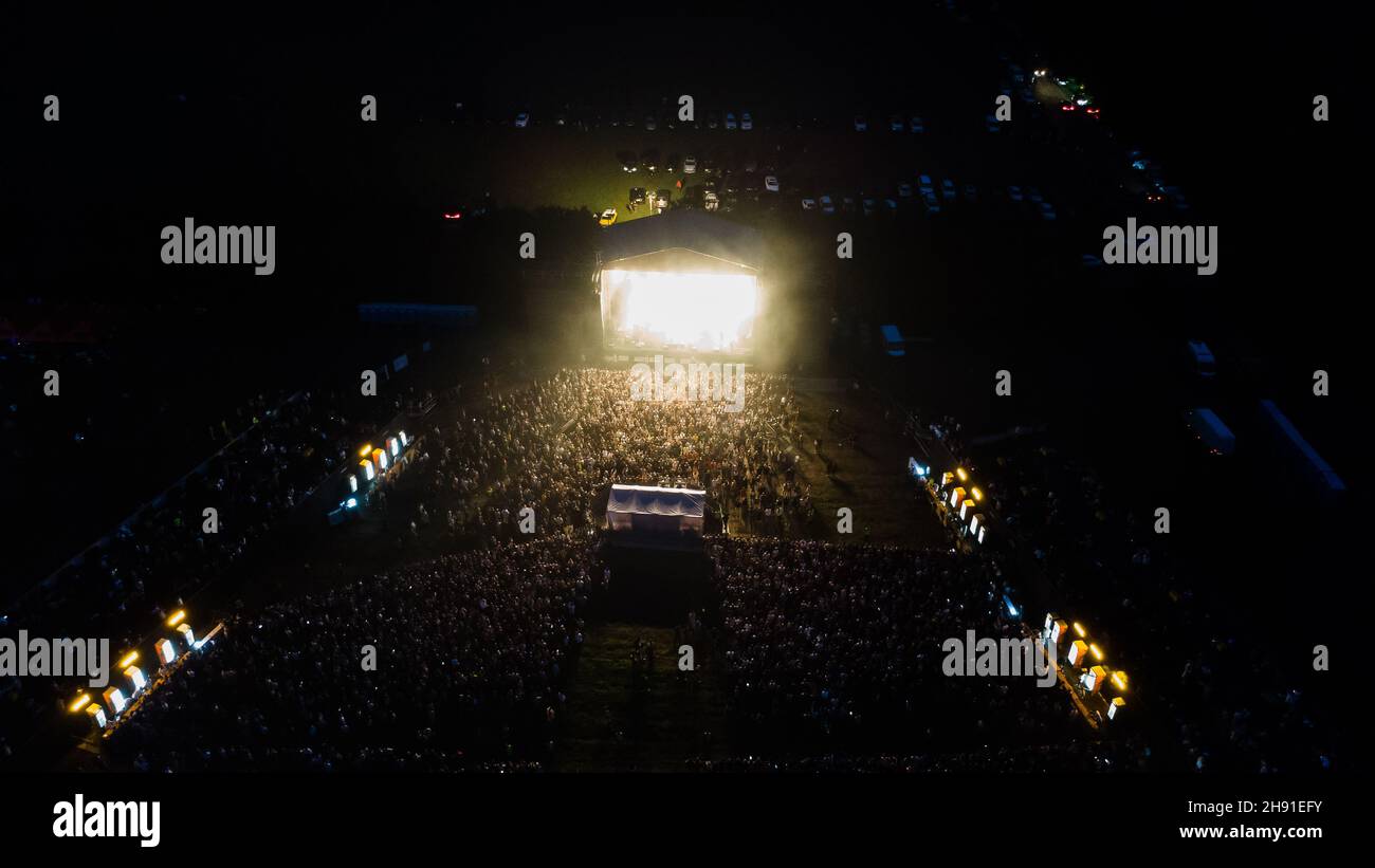 open concert in the field at night Stock Photo - Alamy