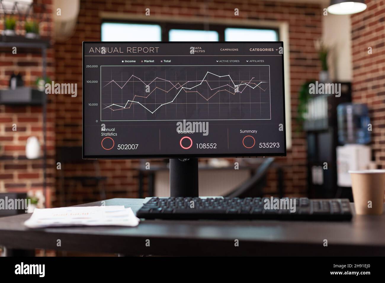 Close up of computer showing company growth analysis in office. Monitor ...