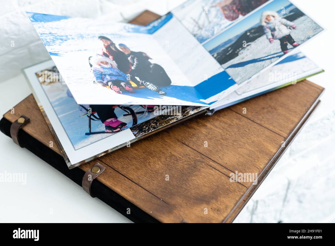 photo book with wooden cover. unfolded photobook. sample photobook ...