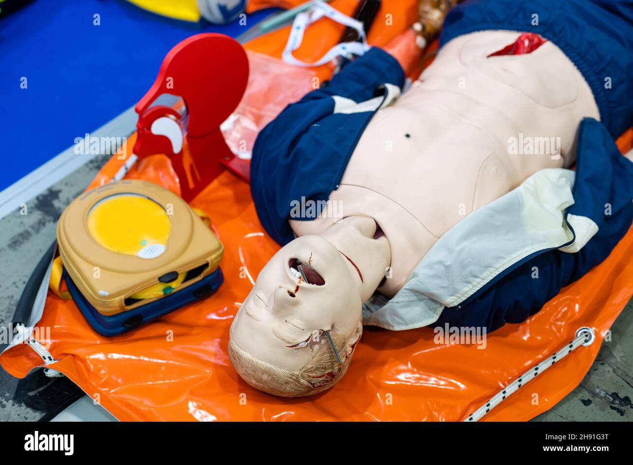 First aid, model man stretcher Stock Photo - Alamy