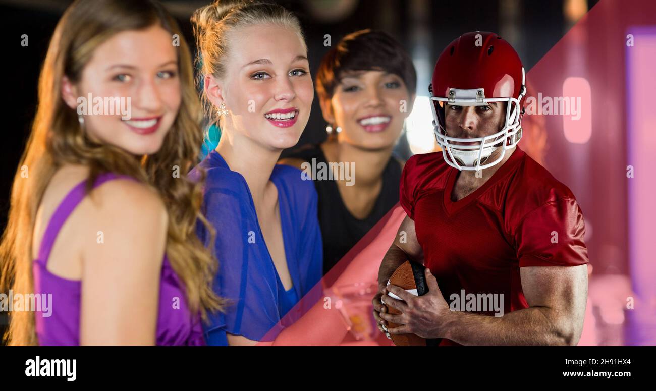 Portrait of smiling female fans at sports bar watching american ...