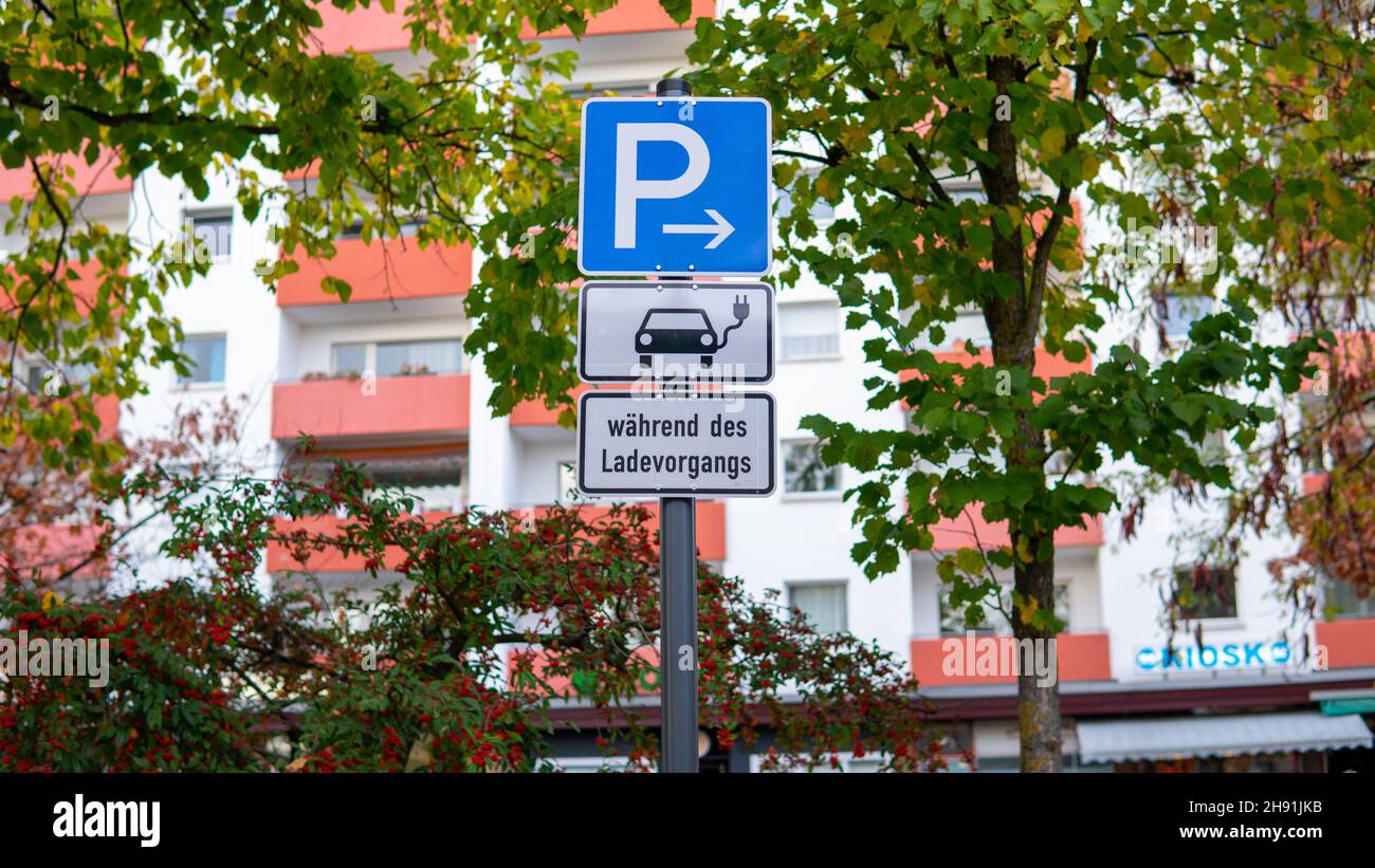 electric car loading and parking sign in germany Stock Photo - Alamy