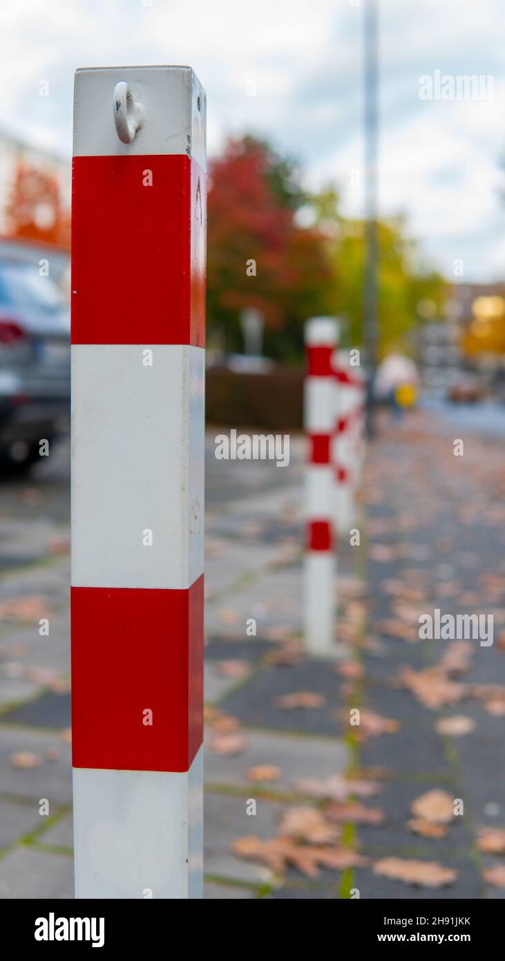 red white traffic bollard in germany Stock Photo - Alamy
