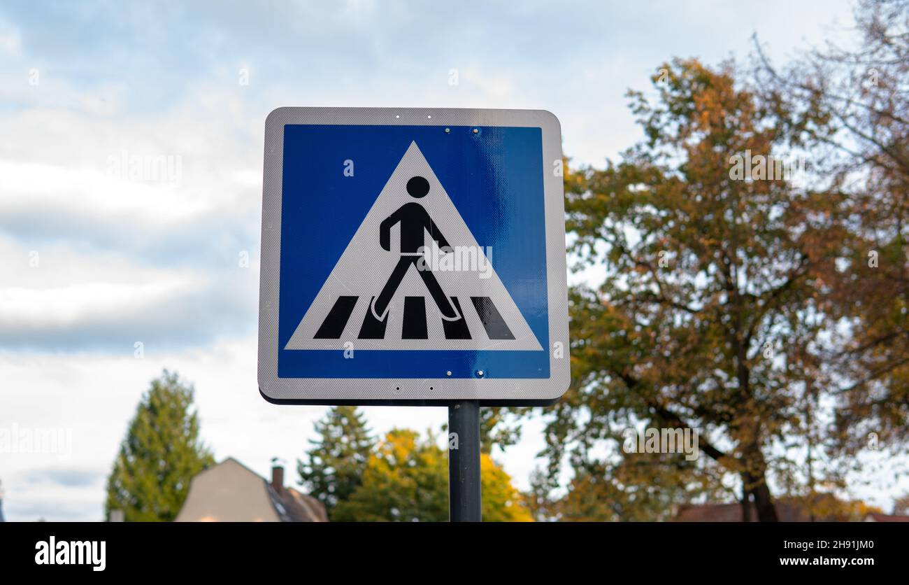 crosswalk zebra crossing traffic sign in germany Stock Photo - Alamy