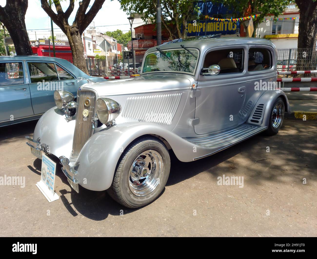 BUENOS AIRES, ARGENTINA - Nov 08, 2021: Vintage silver Ford sedan Tudor ...
