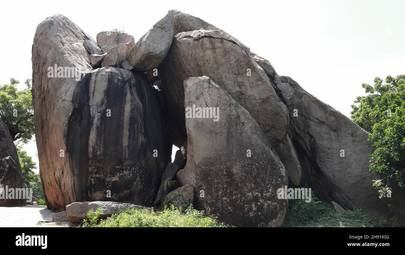 The large rock on the ground is located in the natural background Stock ...