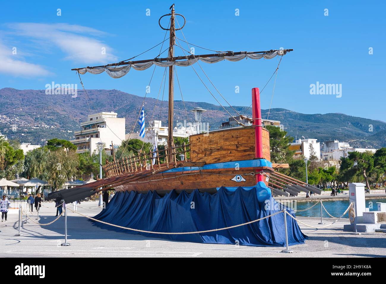 University building and the mythical ship Argo in the port of Volos ...
