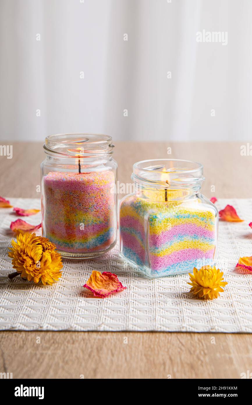 Children made fun colorful layered wax powder candles in home by ...