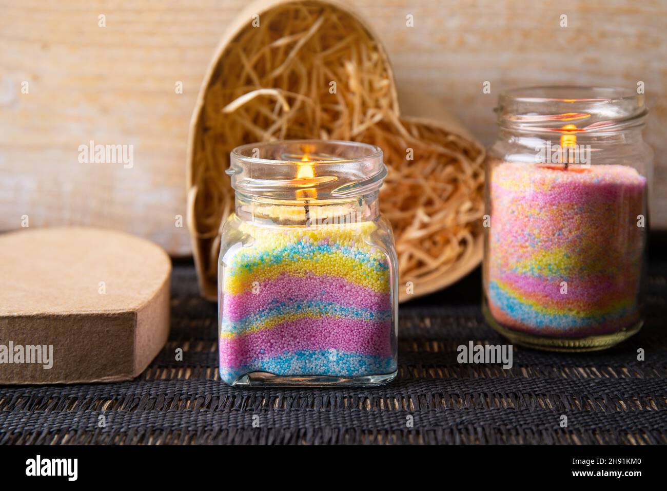 Children made fun colorful layered wax powder candles in home by ...