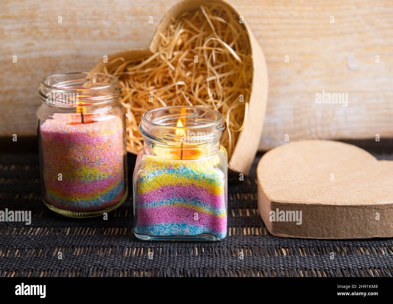Children made fun colorful layered wax powder candles in home by ...