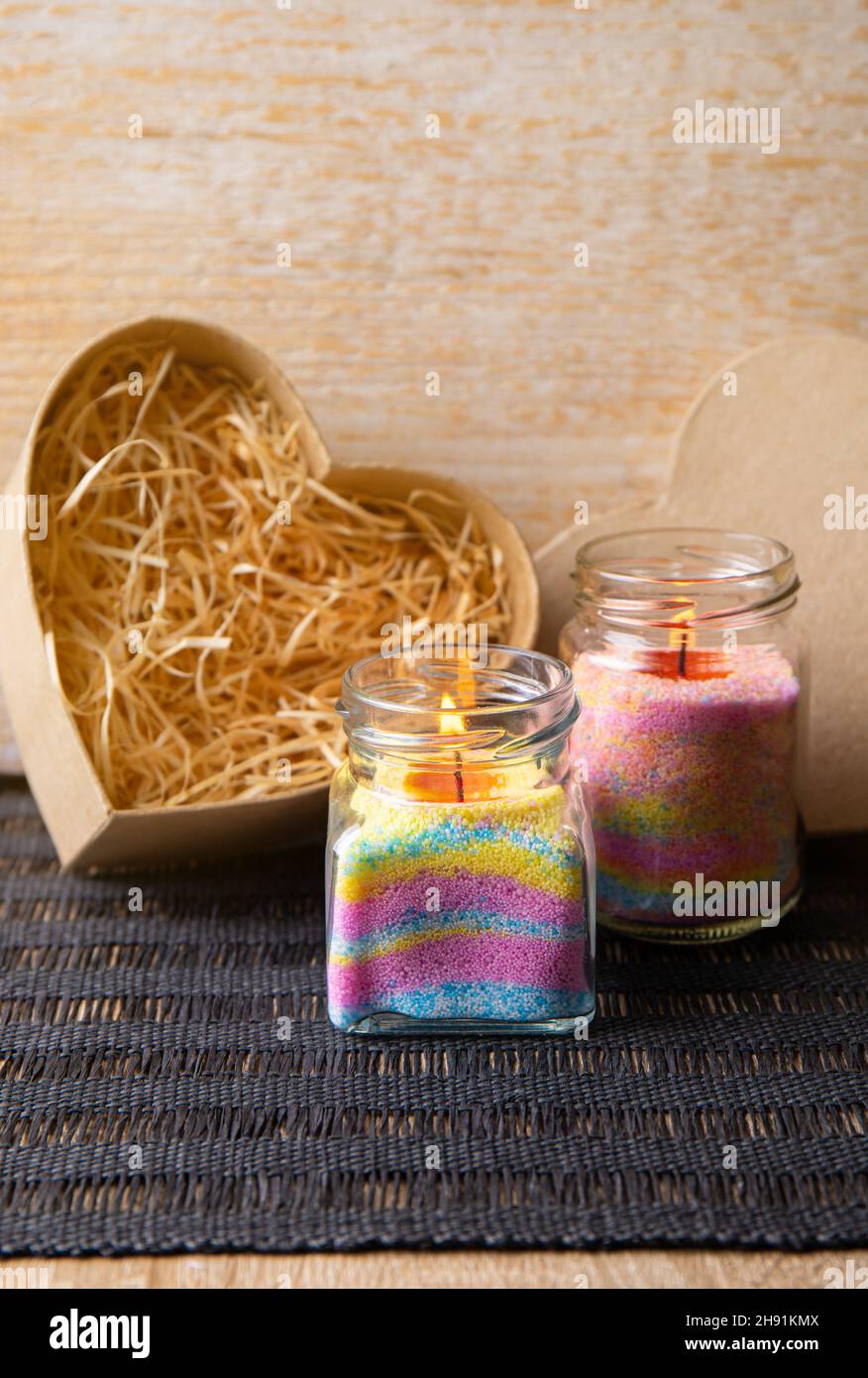 Children made fun colorful layered wax powder candles in home by ...