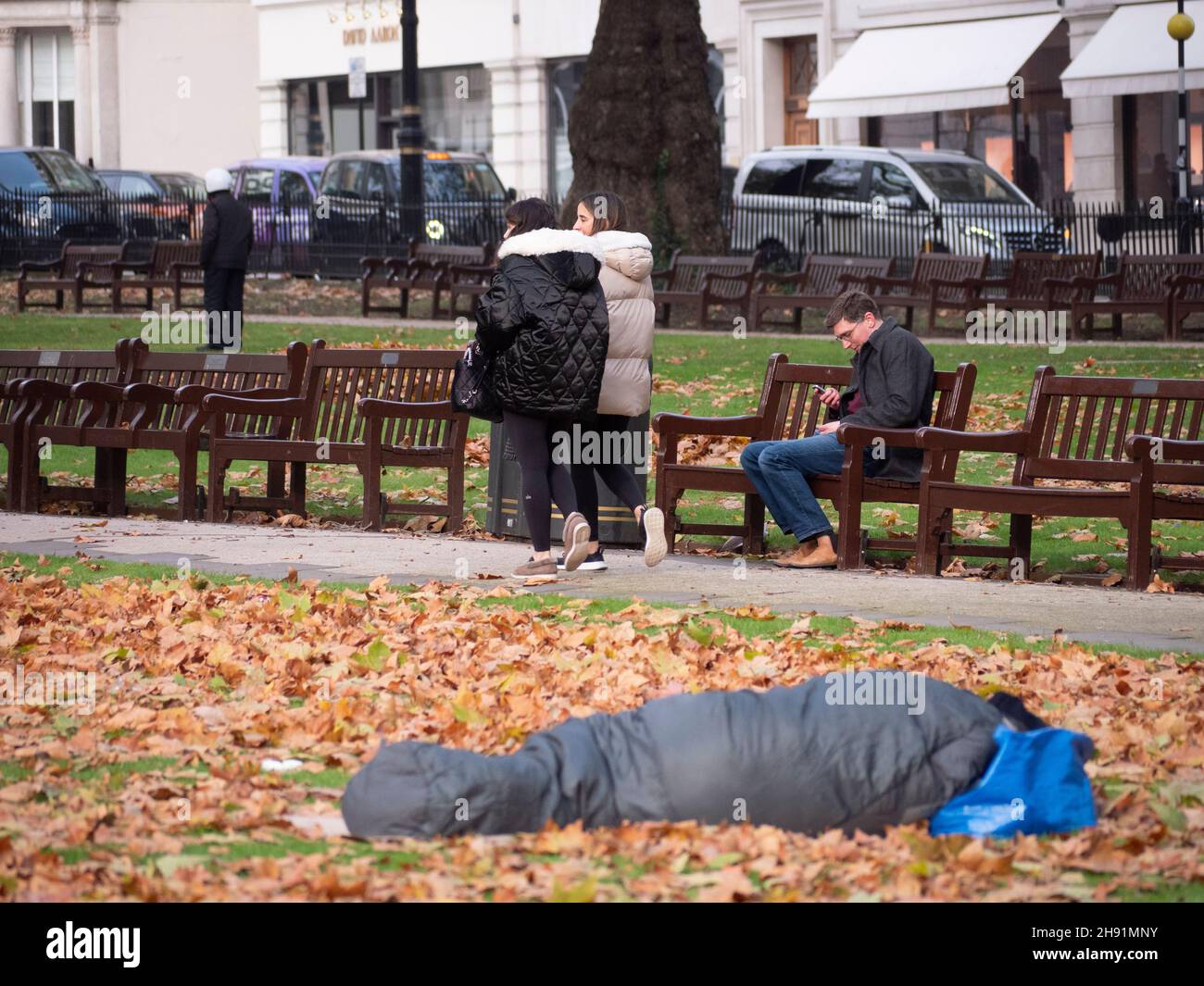 Rich poor divide inequality, Homeless person sleeping in Berkeley ...