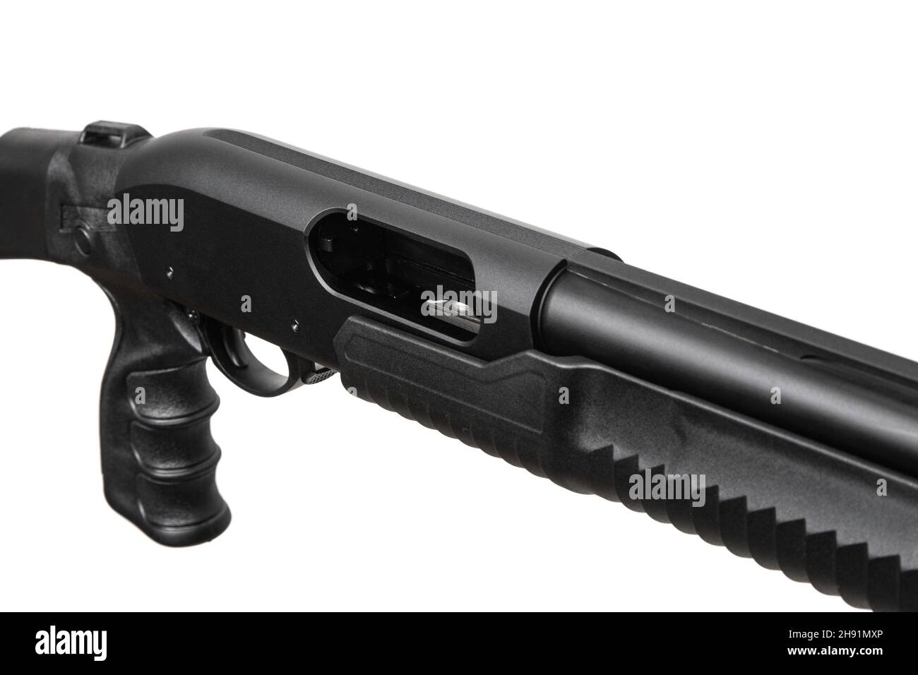 Pump-action 12 gauge shotgun isolated on a white background. A smooth ...